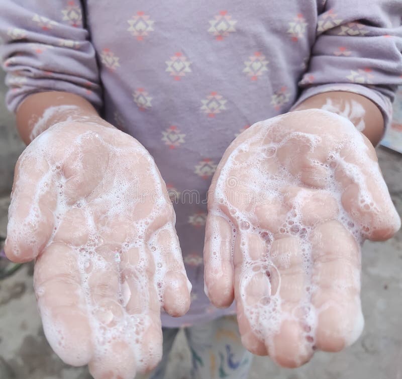 A boy washing his hands stock photo. Image of caucasian - 171423598