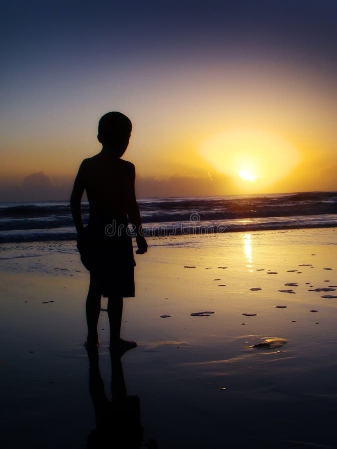 Boy watching sunrise stock image. Image of bright, atlantic - 15104145