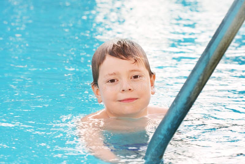 Boy in water stock image. Image of caucasian, rails, person - 11779623