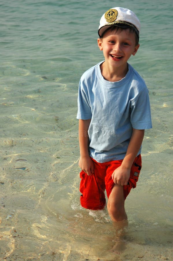 Boy in the water. stock image. Image of play, lifestyle - 5128389