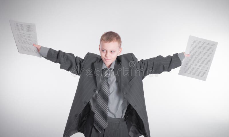 Boy looks on paper stock image. Image of learn, human - 30363295