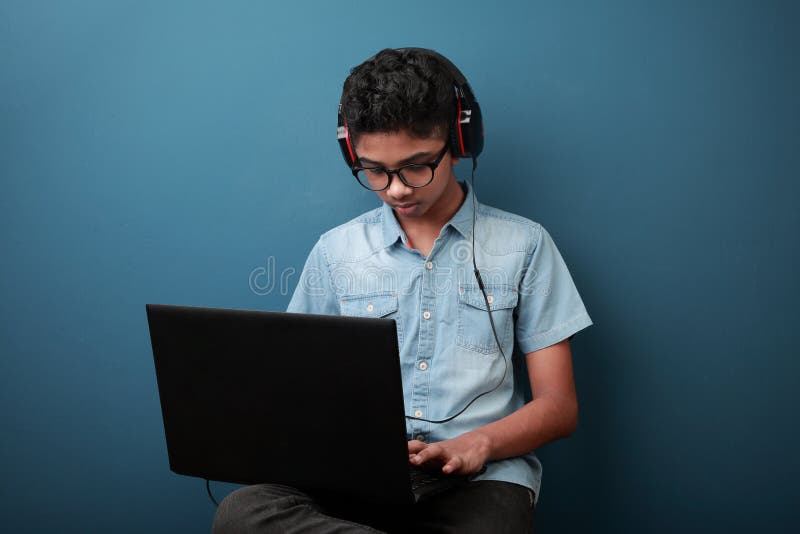 Boy Wearing Headset with Laptop Stock Image - Image of computer ...
