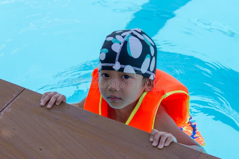 A Boy Wearing a Life Jacket Stock Photo - Image of jacket, happy: 85314036