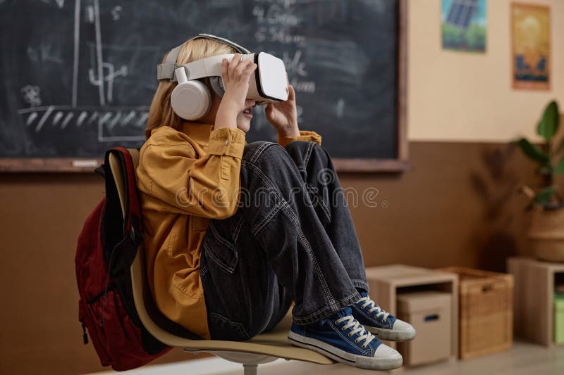 Boy Wearing VR Headset Enjoying Immersive Learning Experience Stock ...