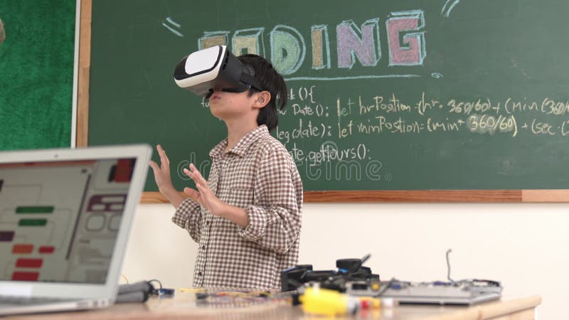 Boy Wearing VR Headset To Enter Metaworld while Girl Coding System ...