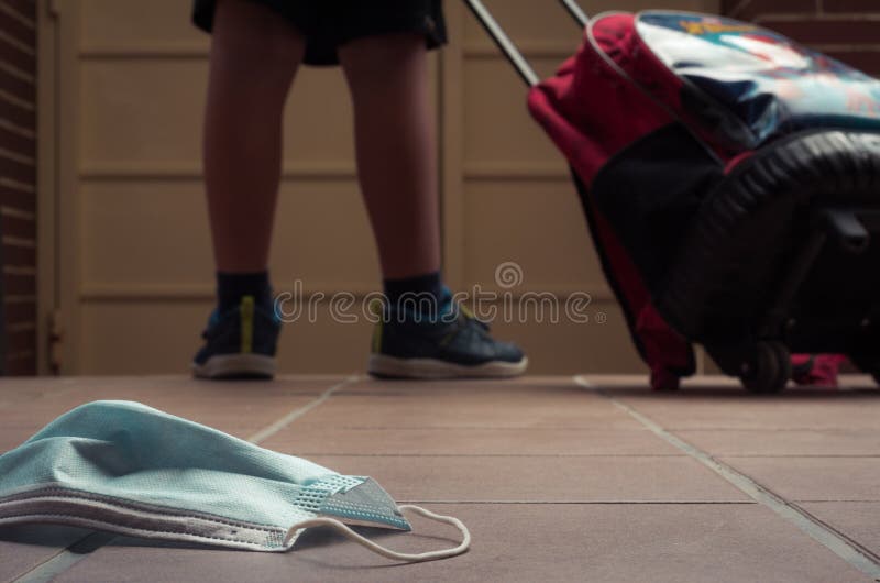 Boy with a Wheeled Backpack Ready for Back To School Leaving Behind a ...