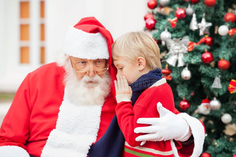 Boy Whispering in Santa Claus S Ear Stock Image - Image of december ...