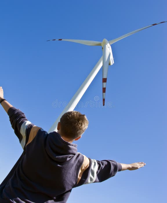 Boy and wind turbine stock image. Image of holds, concept - 5474565