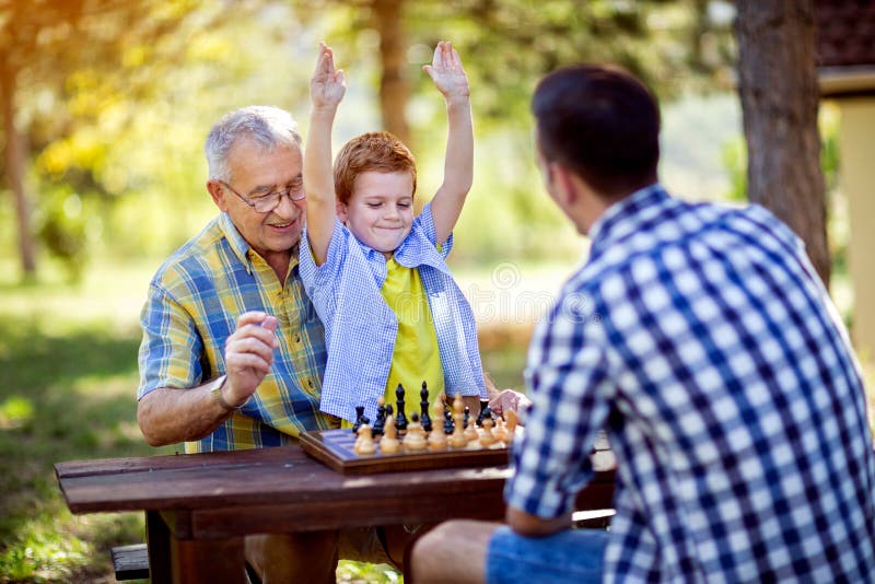 Boy is Winning in Chess Game Stock Photo - Image of cheerful, relax ...