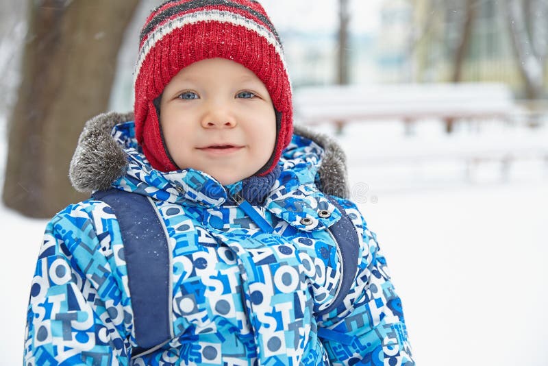 Boy in winter park stock photo. Image of holiday, face - 49480486