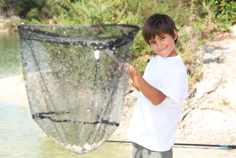 Young Boy Holding Fishing Net Stock Photos - Free & Royalty-Free Stock ...
