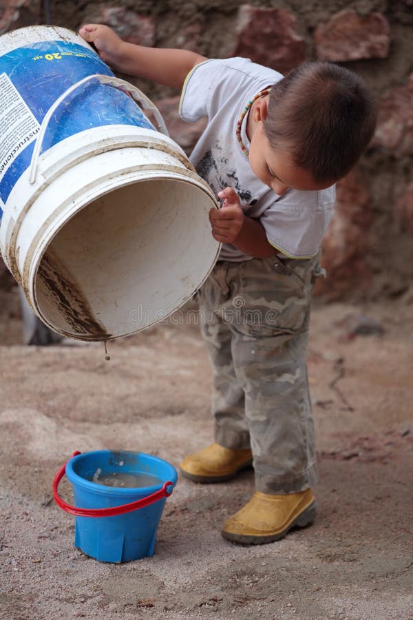 Boy at work stock photo. Image of buckets, build, dirty - 13907750