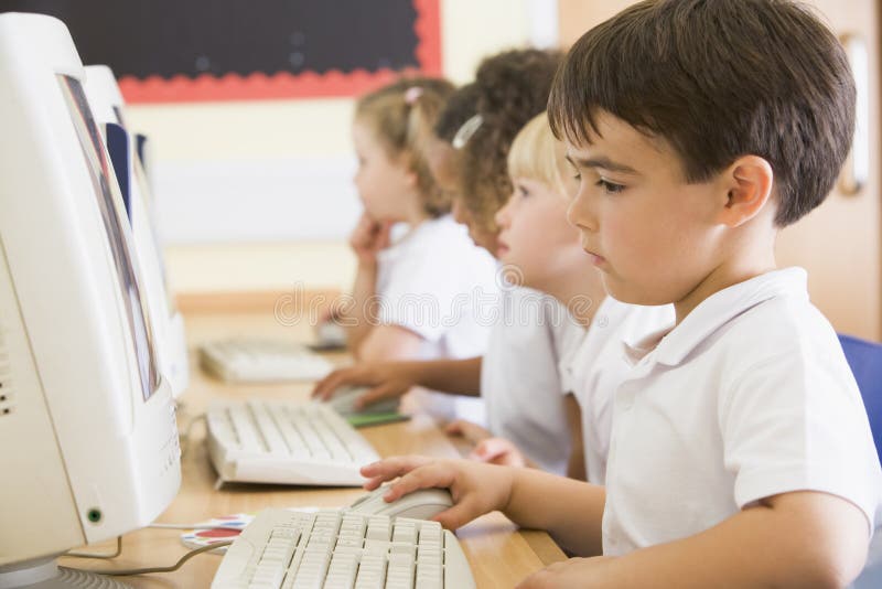 Girl Working on a Computer at Primary School Stock Image - Image of ...