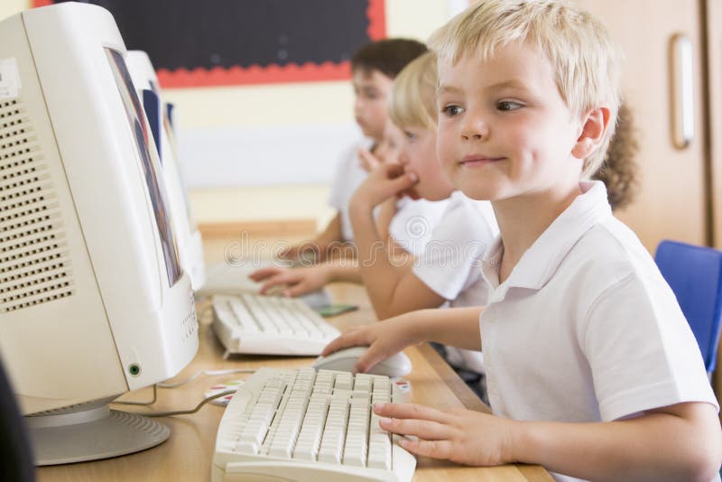 Boy Working on a Computer at Primary School Stock Image - Image of ...