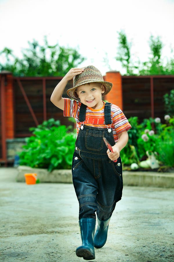 Boy working in the garden stock image. Image of caucasian - 44148719