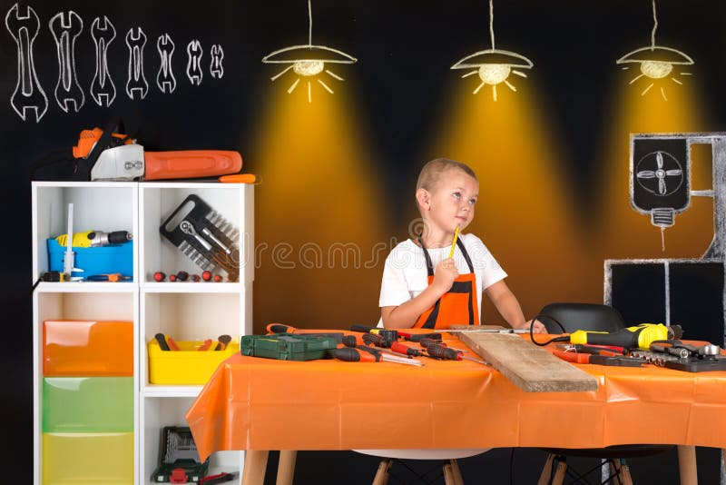 Boy Working in His Father`s Carpentry Workshop. Stock Image - Image of ...