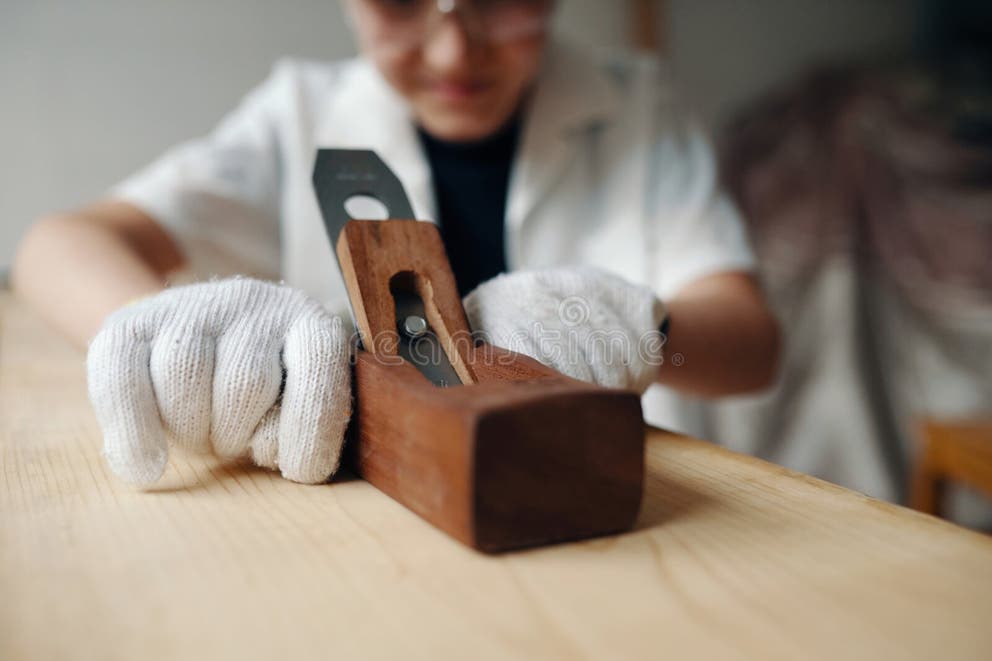 Boy Working with Jigsaw in Carpentry Workshop Stock Photo - Image of ...