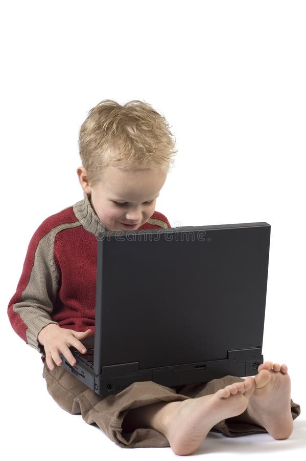 Boy working on a laptop 2 stock image. Image of computer - 4173409