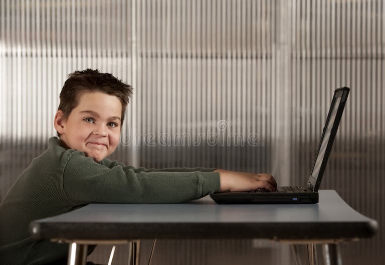 Boy Working on a Laptop Computer Stock Photo - Image of write, type ...
