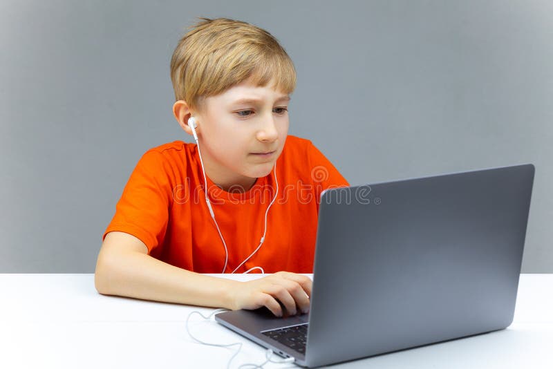 A Boy is Working at a Laptop for Online Learning Stock Photo - Image of ...