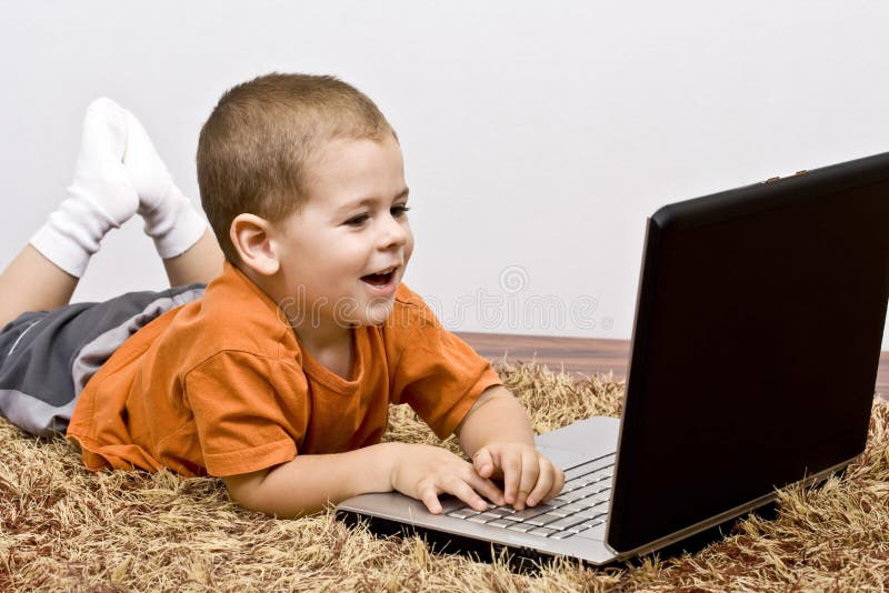 Boy working whit laptop stock image. Image of casual - 11221501