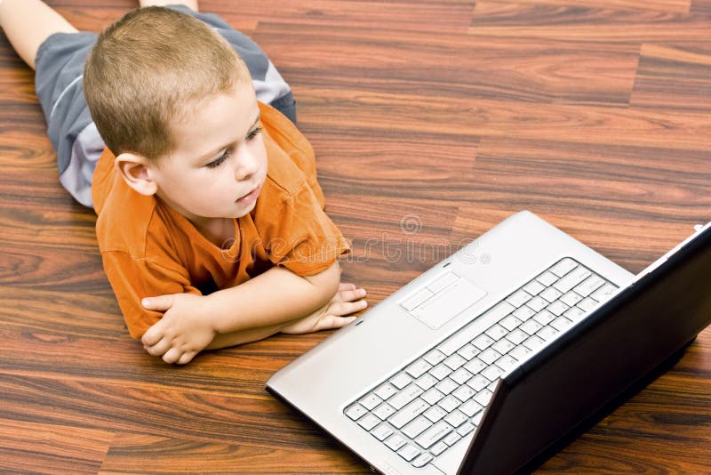 Boy working whit laptop stock photo. Image of intelligence - 11221530
