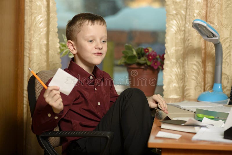 The Boy Works in His Office on a Personal Computer.Holds a Stick Stock ...