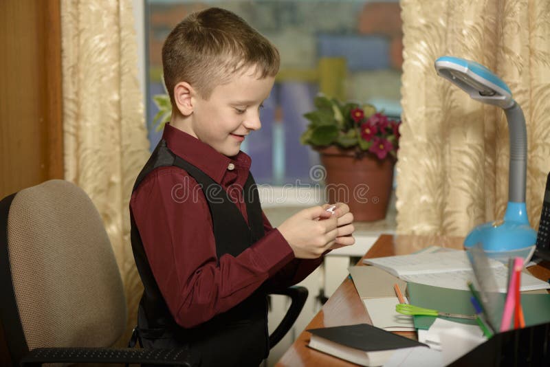 The Boy Works in His Office on a Personal Computer.she Will Cut Stock ...