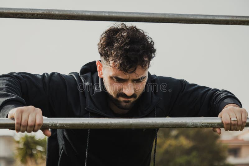 Boy Works Out in Spring Outdoors Doing Push Ups Stock Photo - Image of ...