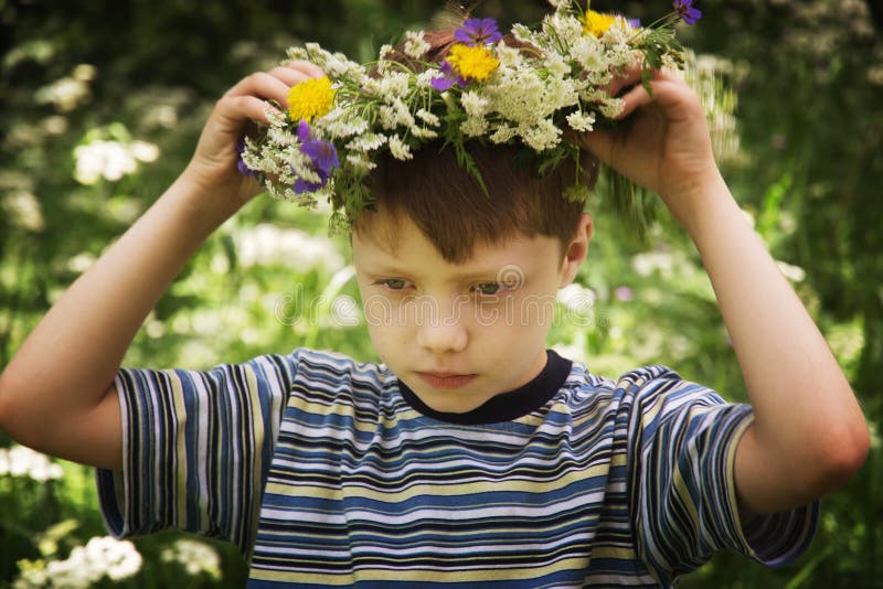 Boy and wreath of flowers stock image. Image of caucasian - 25547329