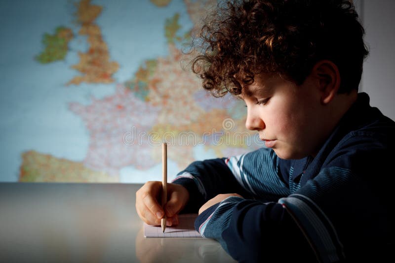 Boy writing stock photo. Image of choolkid, homework - 19295932