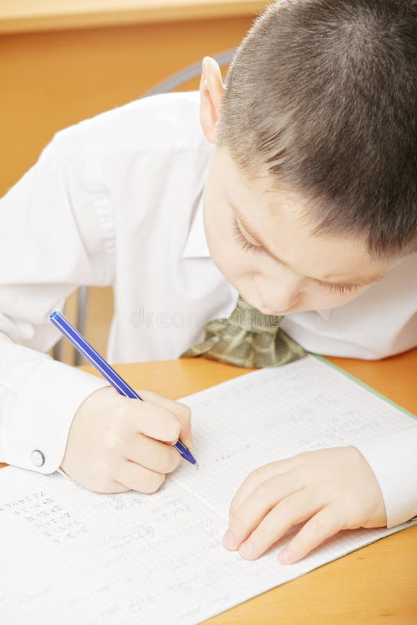Boy writing above view stock photo. Image of formal, writing - 26461748