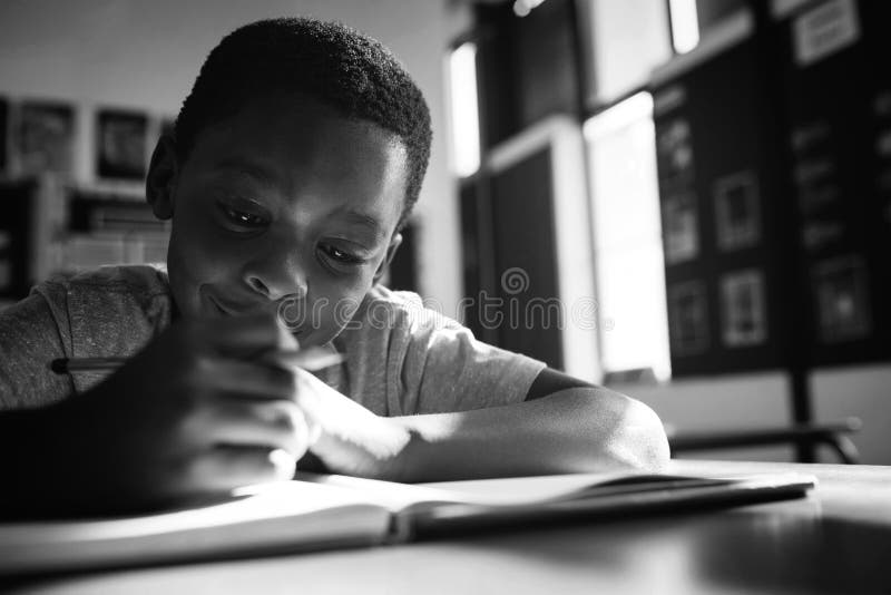 Boy writing in book stock image. Image of shot, copy - 118700597