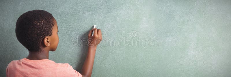Boy Writing with Chalk on Greenboard in School Stock Image - Image of ...
