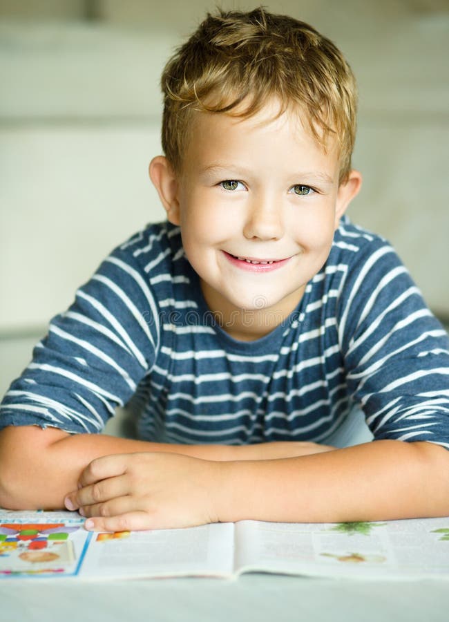 Boy is Writing on His Copybook Stock Photo - Image of activity, playful ...