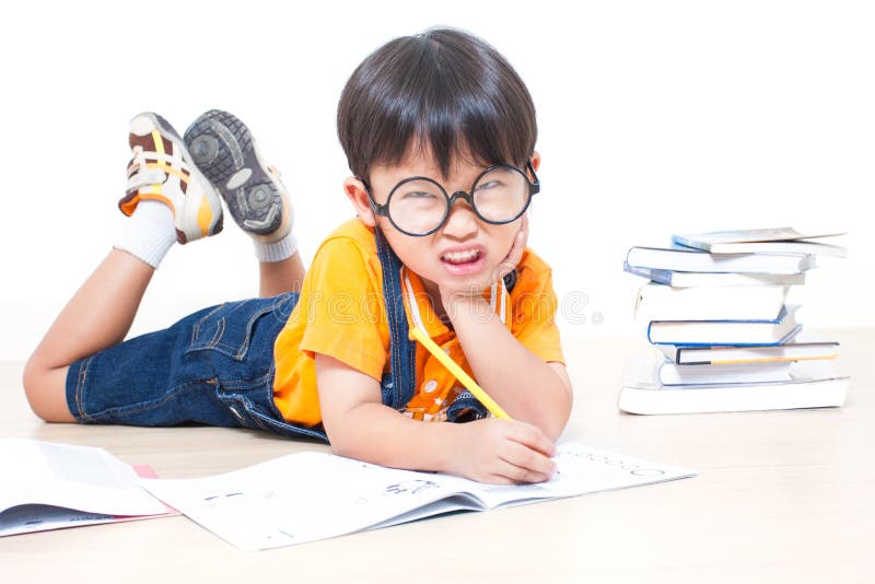 The boy writing homework stock image. Image of child - 45119671
