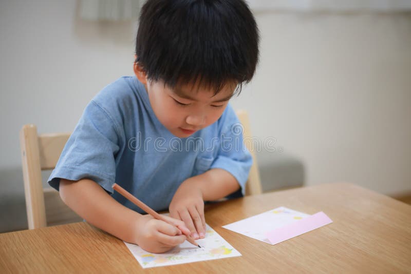 Boy writing a letter stock photo. Image of message, health - 248725090