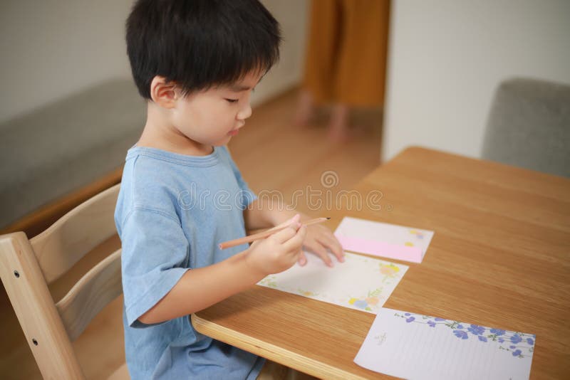 Boy writing a letter stock image. Image of health, beautiful - 248725107