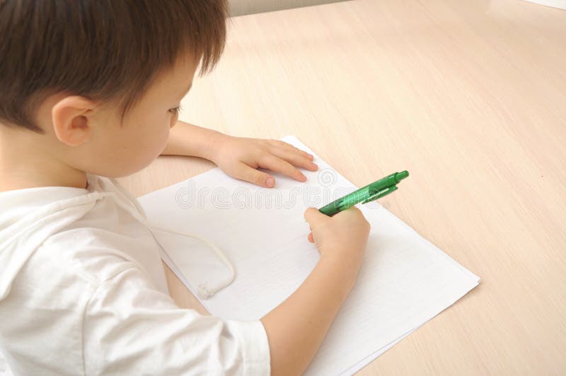 Boy writing stock image. Image of study, writing, educate - 64278557