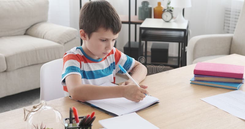 Boy Writing in Notebook and Paper Stock Video - Video of skill, people ...