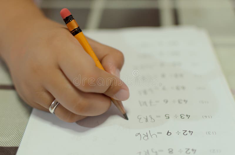 Boy writing on a paper stock photo. Image of difficult - 118537538