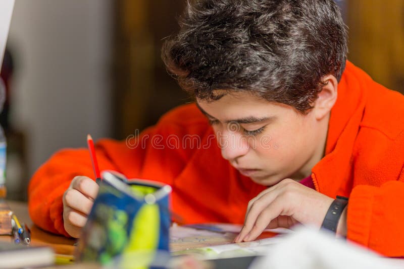 Boy Writing with Red and Blue Pencil Stock Image - Image of mistakes ...