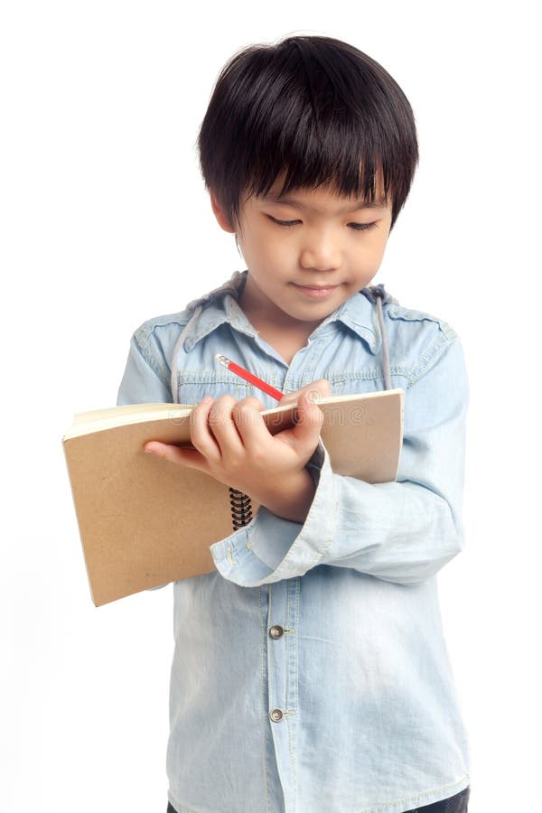 Boy writing with smile stock photo. Image of writing - 39813318