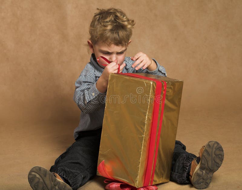 Boy with xmas present stock photo. Image of friend, holiday - 97376126