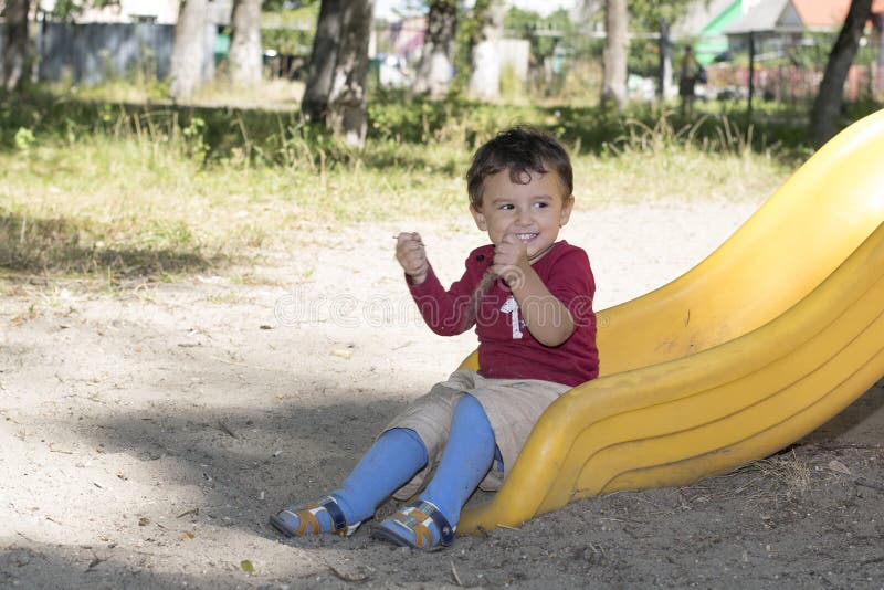 Boy 2 Years Playing in the Playground Stock Photo - Image of looking ...