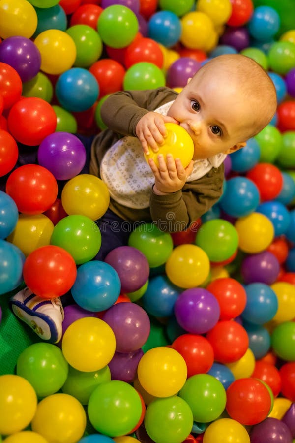 Boy with yellow ball stock photo. Image of blue, childcare - 46079362