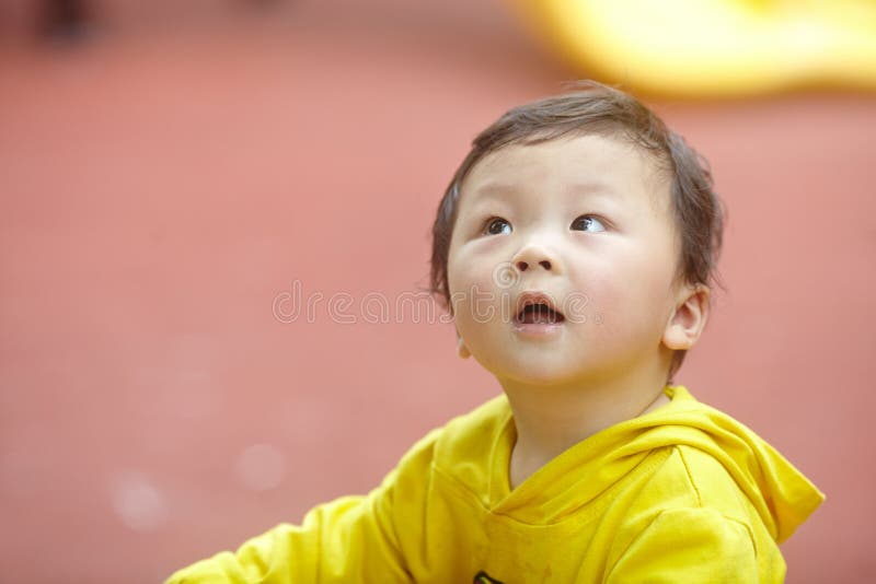 Boy in yellow stock image. Image of sport, playgroud - 53121787