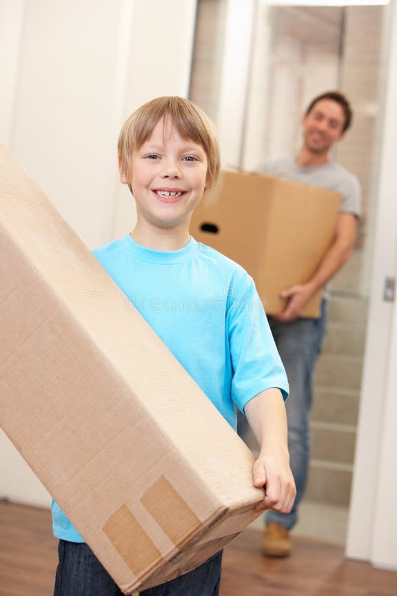 Boy with Young Man on Moving Day Stock Photo - Image of moving ...