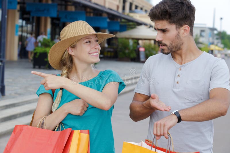 Boyfriend Arguing To Stop Shopping Stock Photo - Image of consumerism ...
