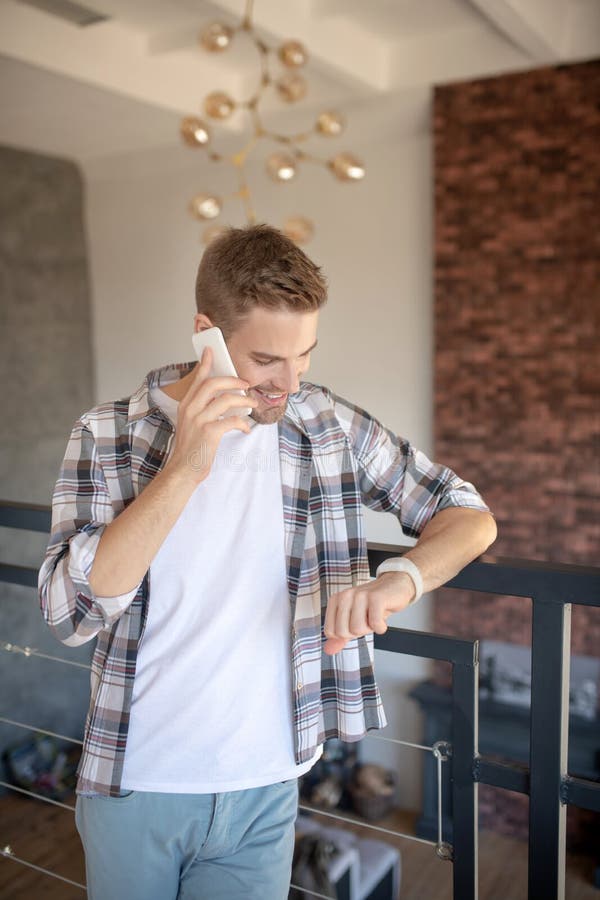 Boyfriend Checking Time on Smart Watch before Going To Date Stock Photo ...